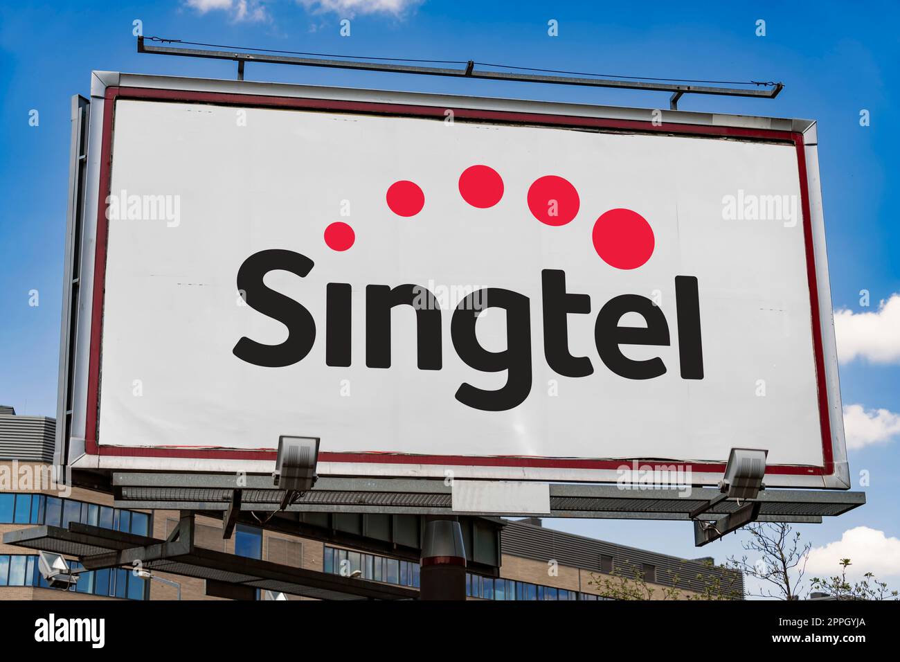 Advertisement billboard displaying logo of Singtel Stock Photo - Alamy