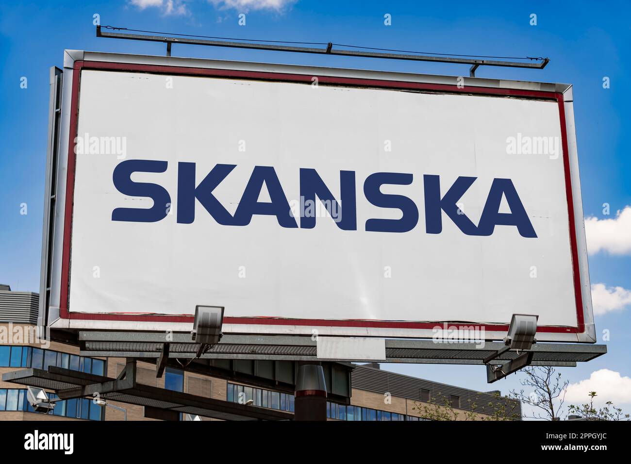 Advertisement billboard displaying logo of Skanska Stock Photo - Alamy