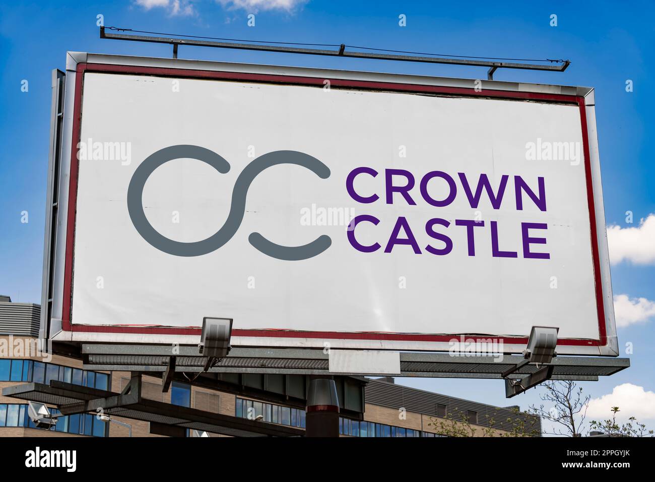 Advertisement billboard displaying logo of Crown Castle Stock Photo - Alamy
