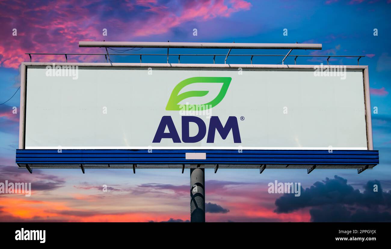 Advertisement billboard displaying logo of ADM Stock Photo - Alamy
