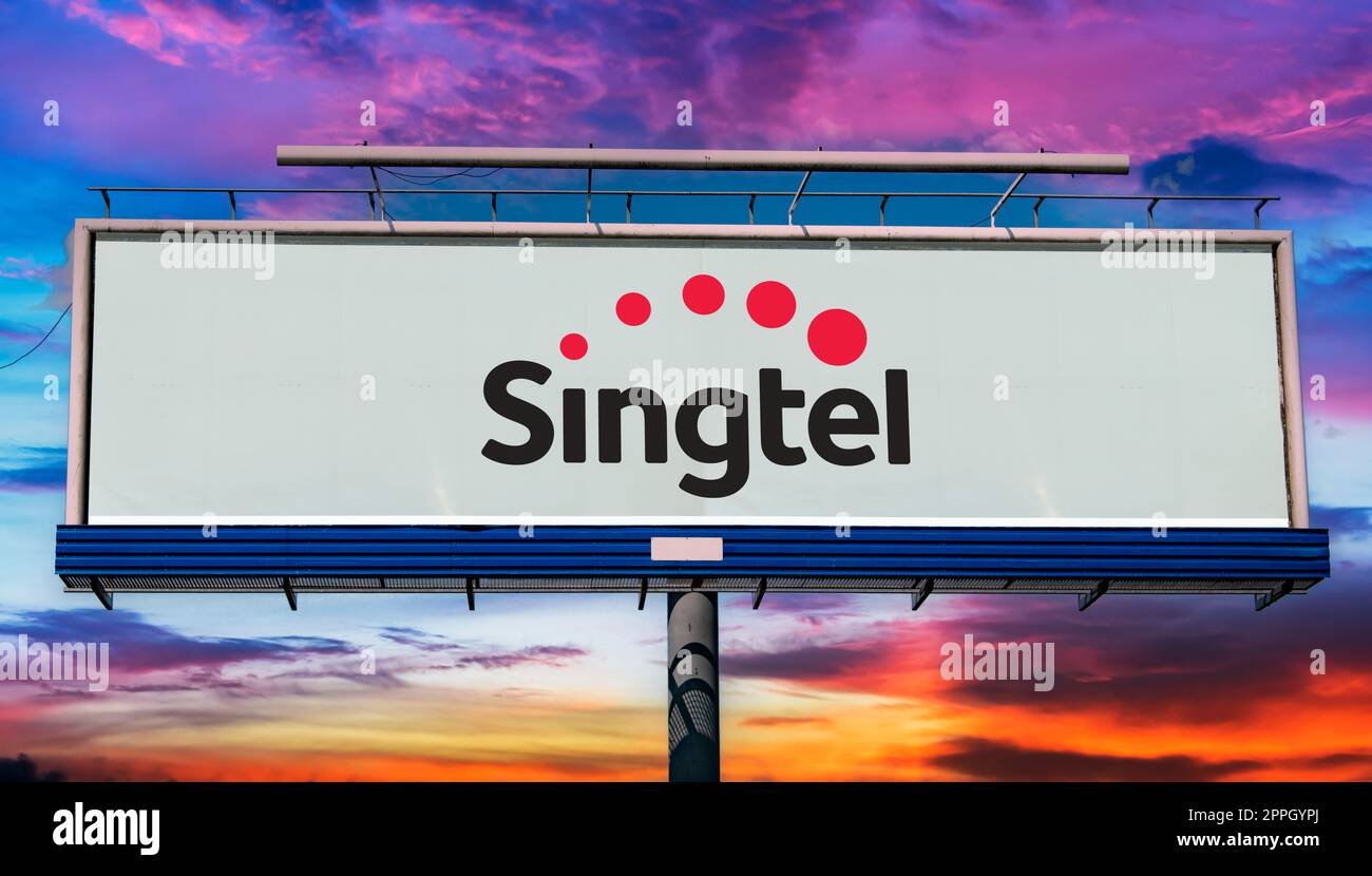 Advertisement billboard displaying logo of Singtel Stock Photo - Alamy
