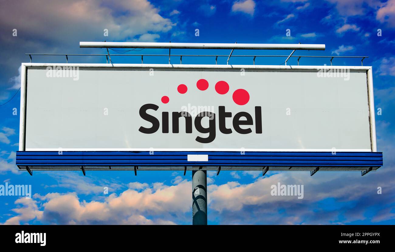 Advertisement billboard displaying logo of Singtel Stock Photo - Alamy