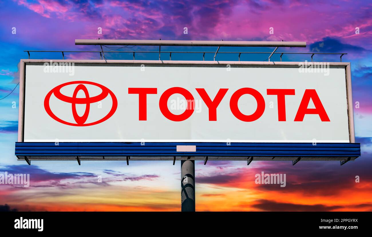 Advertisement billboard displaying logo of Toyota Stock Photo - Alamy