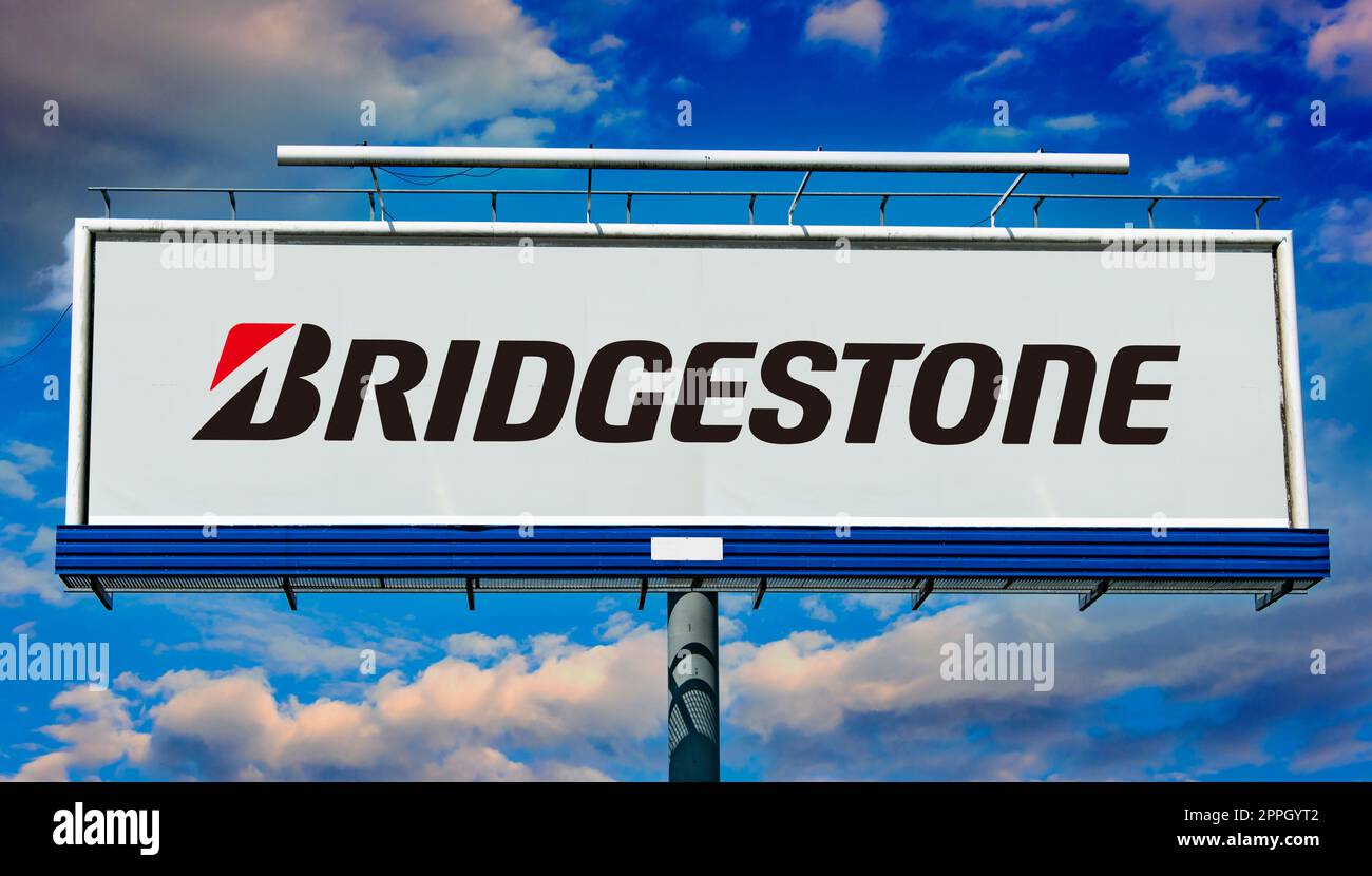 Advertisement billboard displaying logo of Bridgestone Stock Photo - Alamy