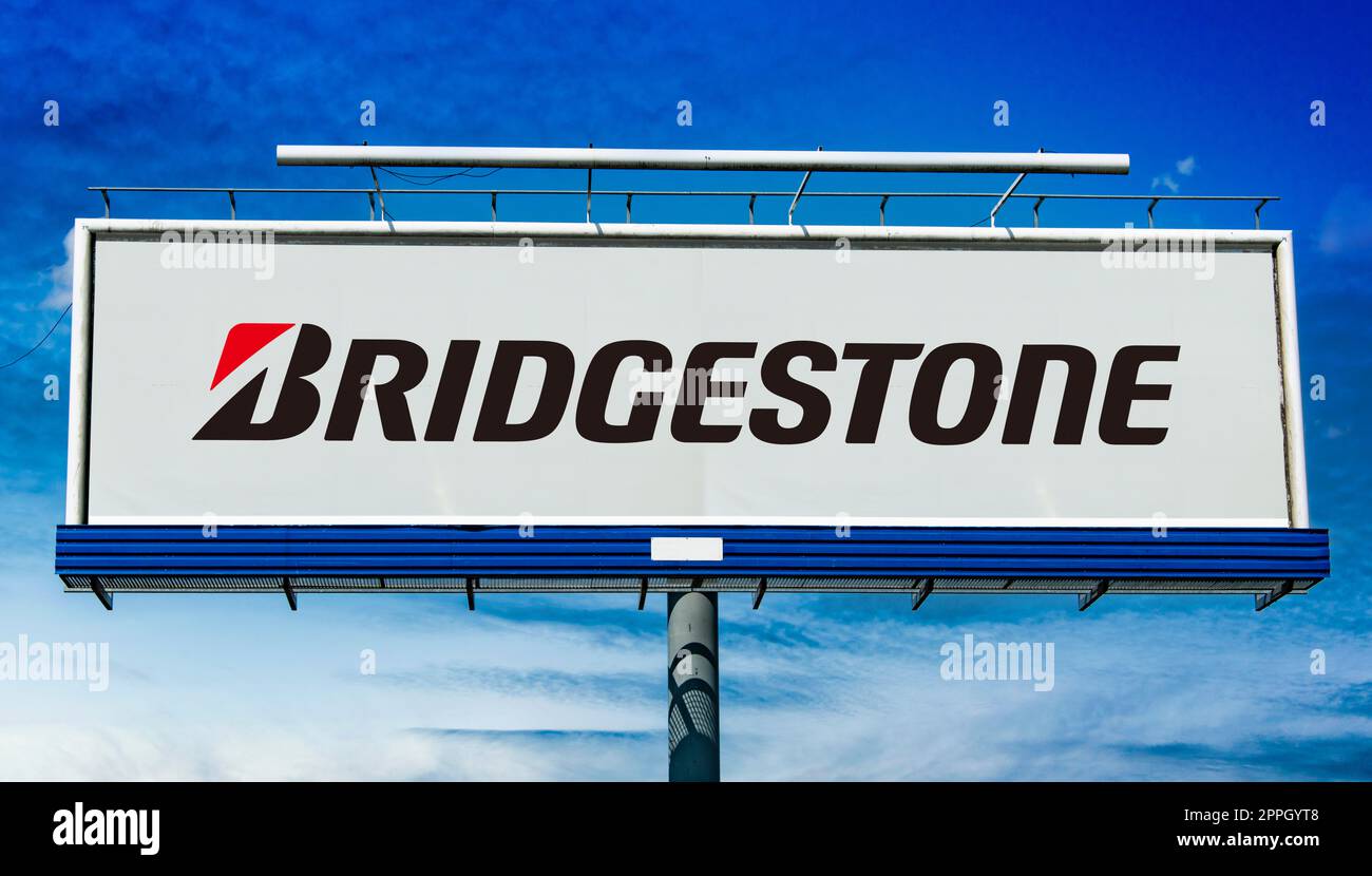 Advertisement billboard displaying logo of Bridgestone Stock Photo - Alamy