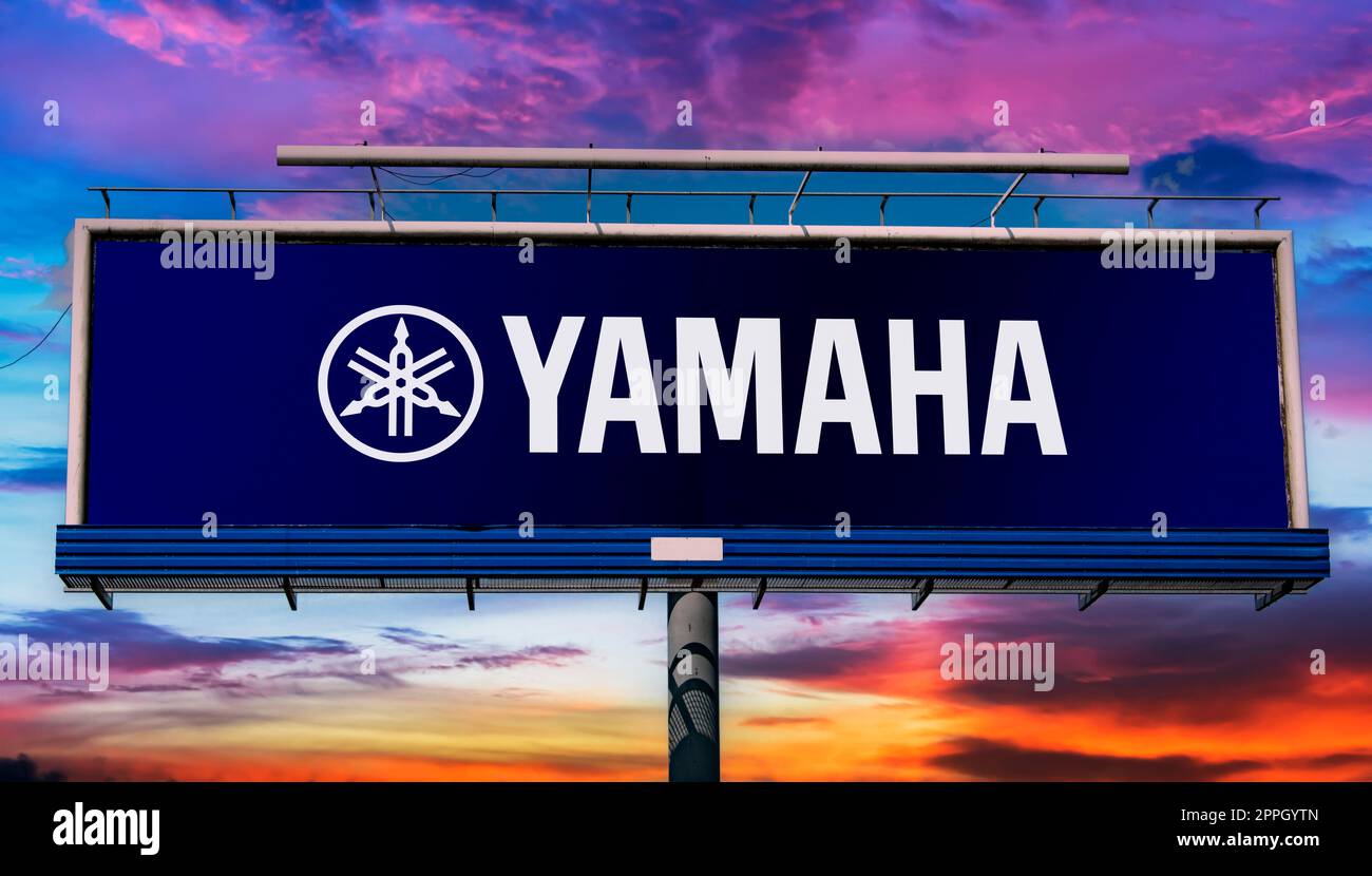 Advertisement billboard displaying logo of Yamaha Stock Photo - Alamy