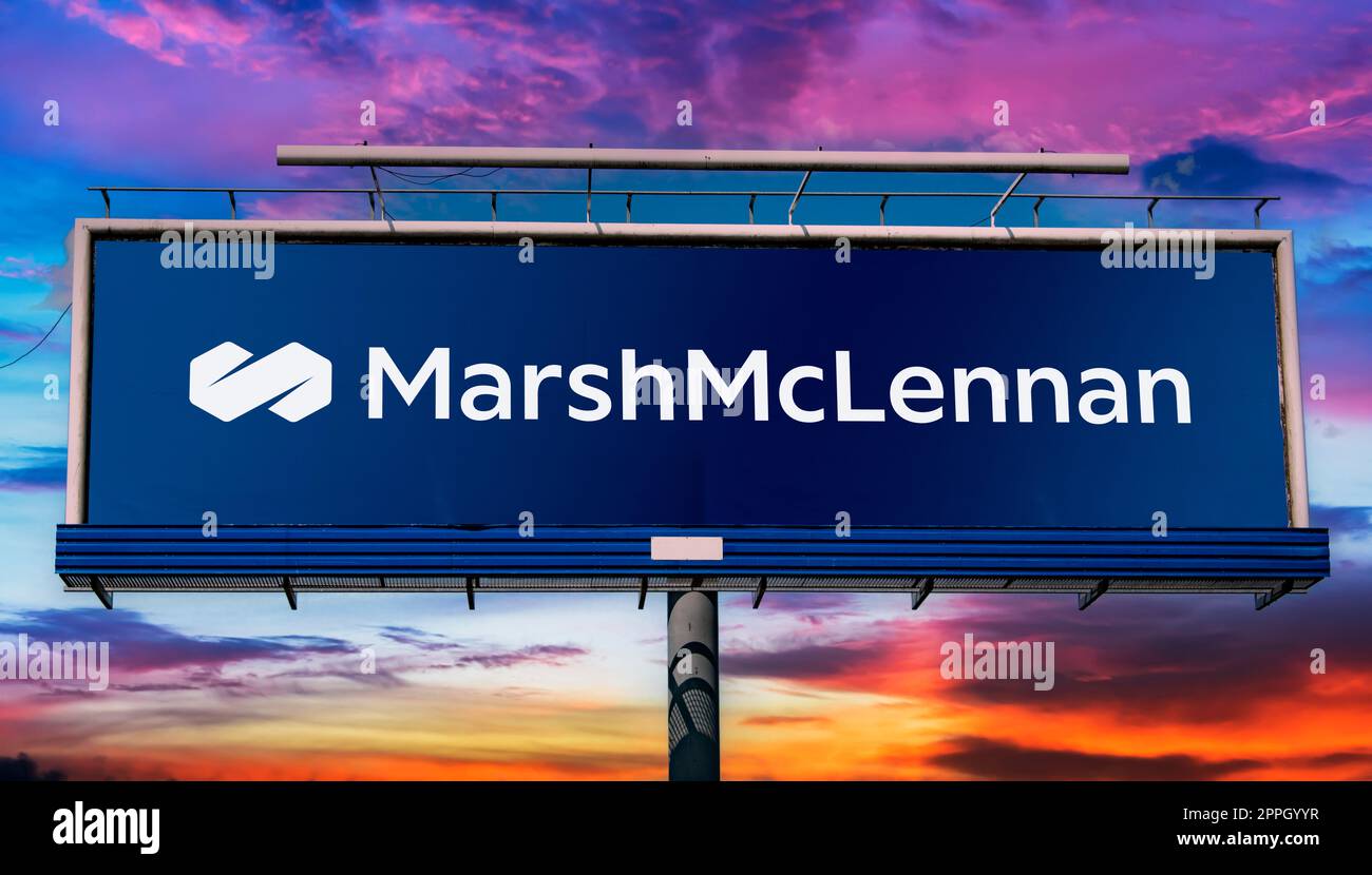 Advertisement billboard displaying logo of Marsh McLennan Stock Photo ...