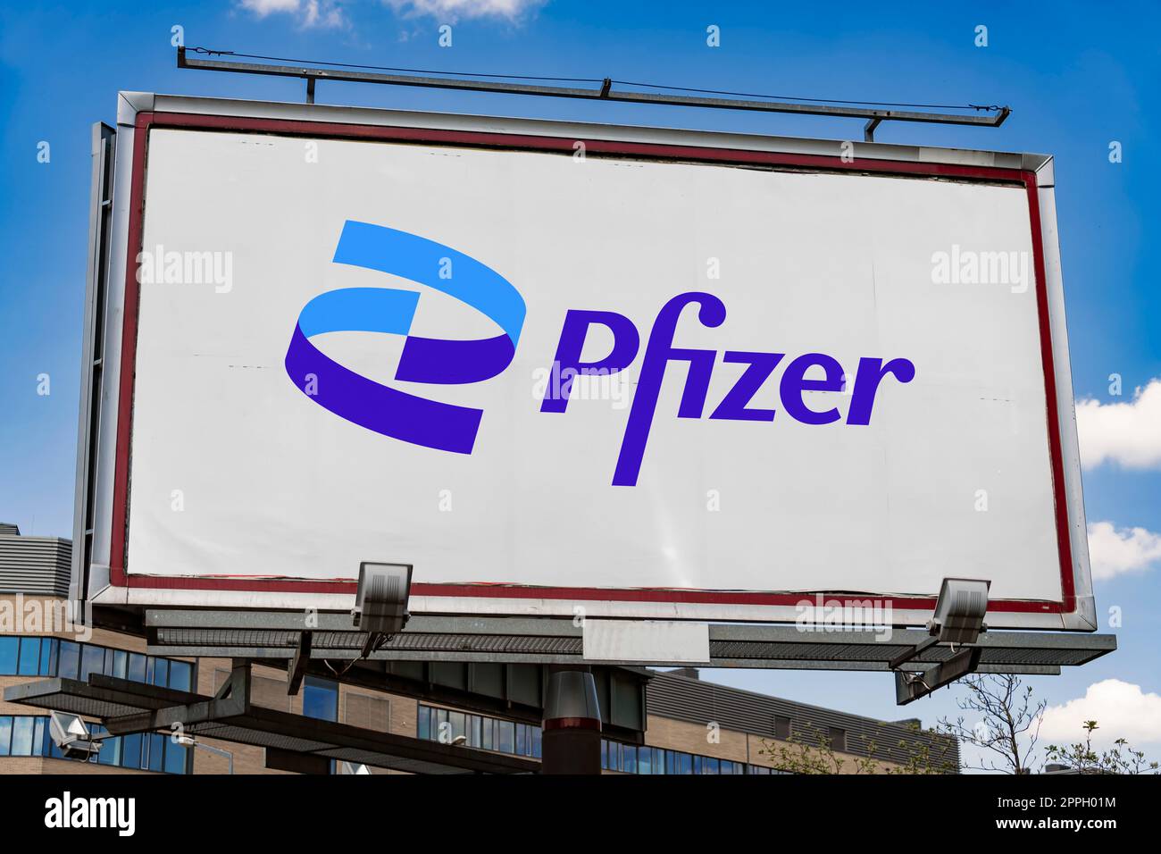 Advertisement billboard displaying logo of Pfizer Stock Photo - Alamy
