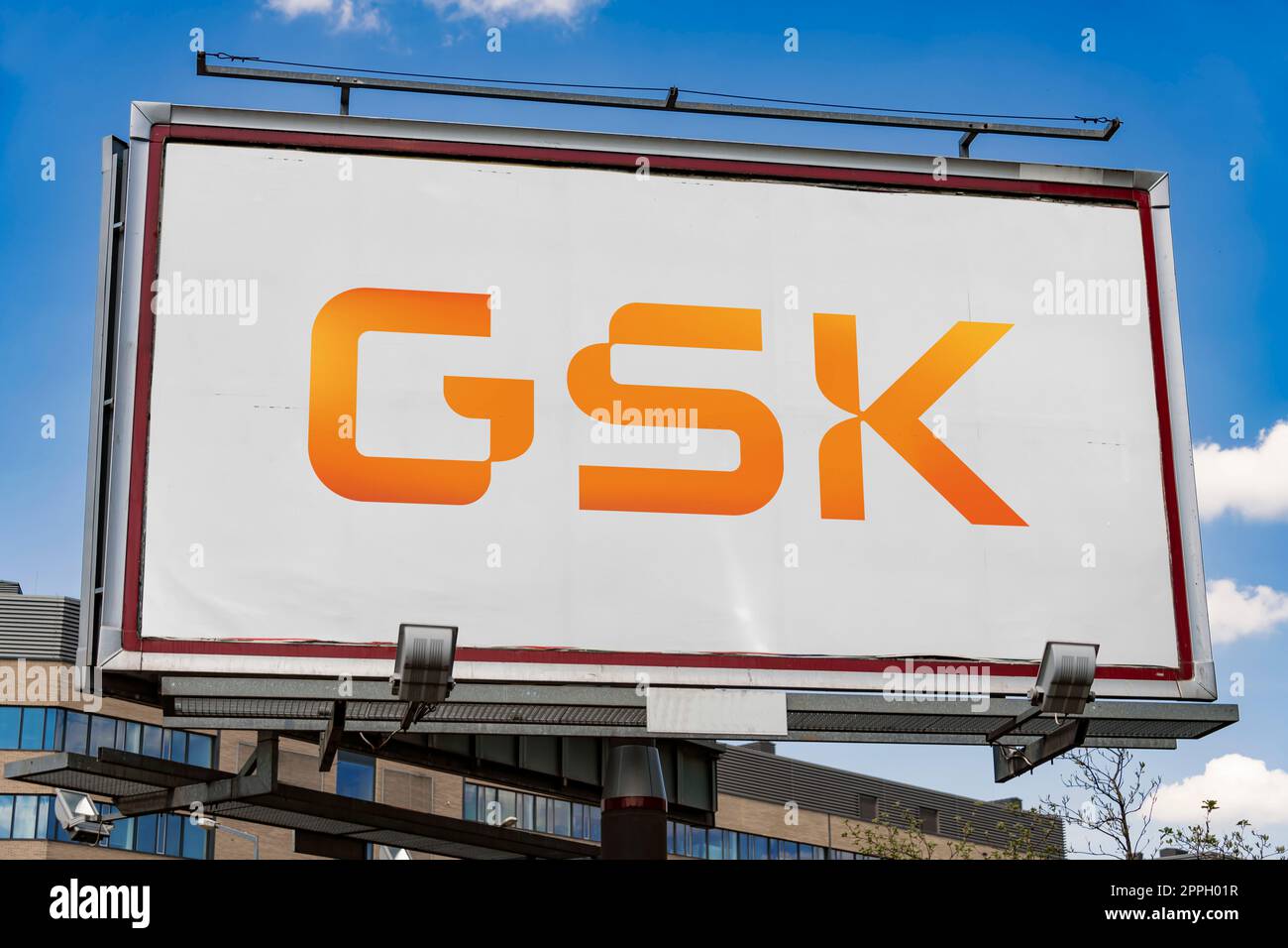 Advertisement billboard displaying logo of GSK Stock Photo - Alamy