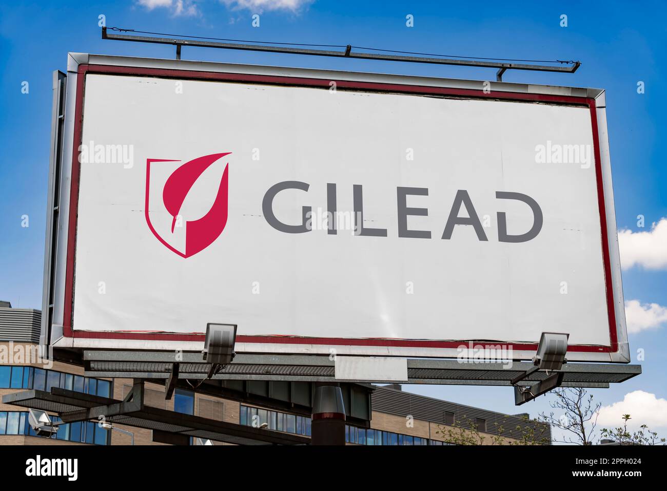 Advertisement billboard displaying logo of Gilead Sciences Stock Photo ...