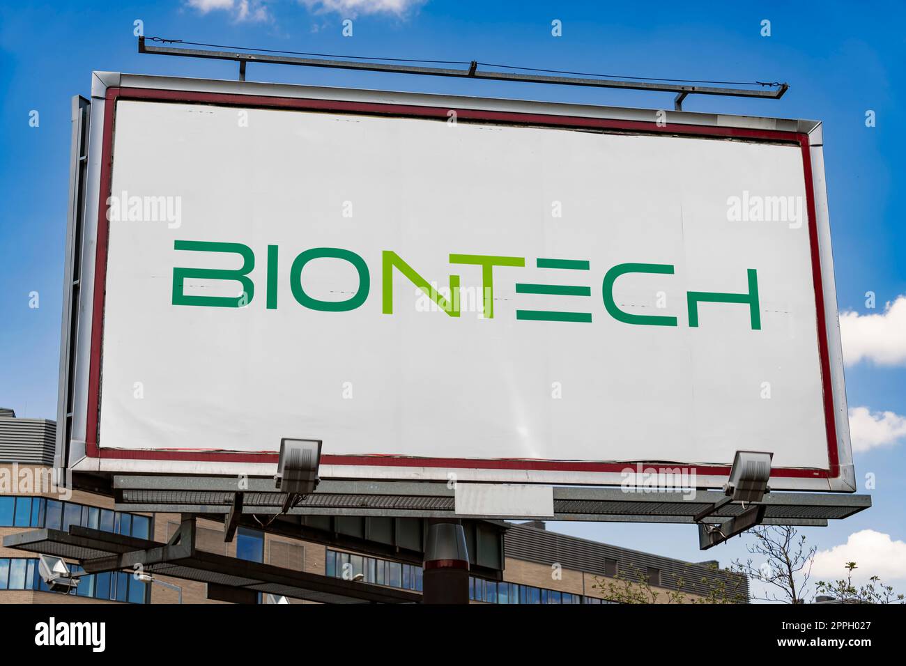 Advertisement billboard displaying logo of BioNTech Stock Photo - Alamy