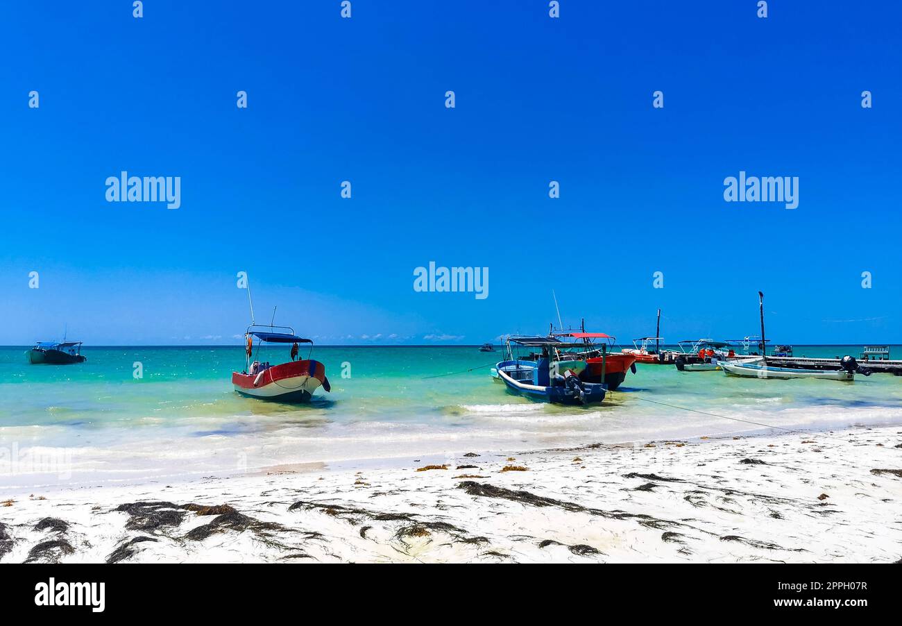 Beautiful Holbox island beach with boat and turquoise water Mexico ...