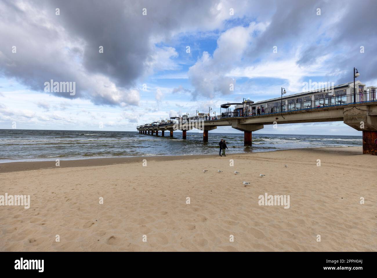 Miedzyzdroje pier, long wooden jetty entering the Baltic Sea from the ...