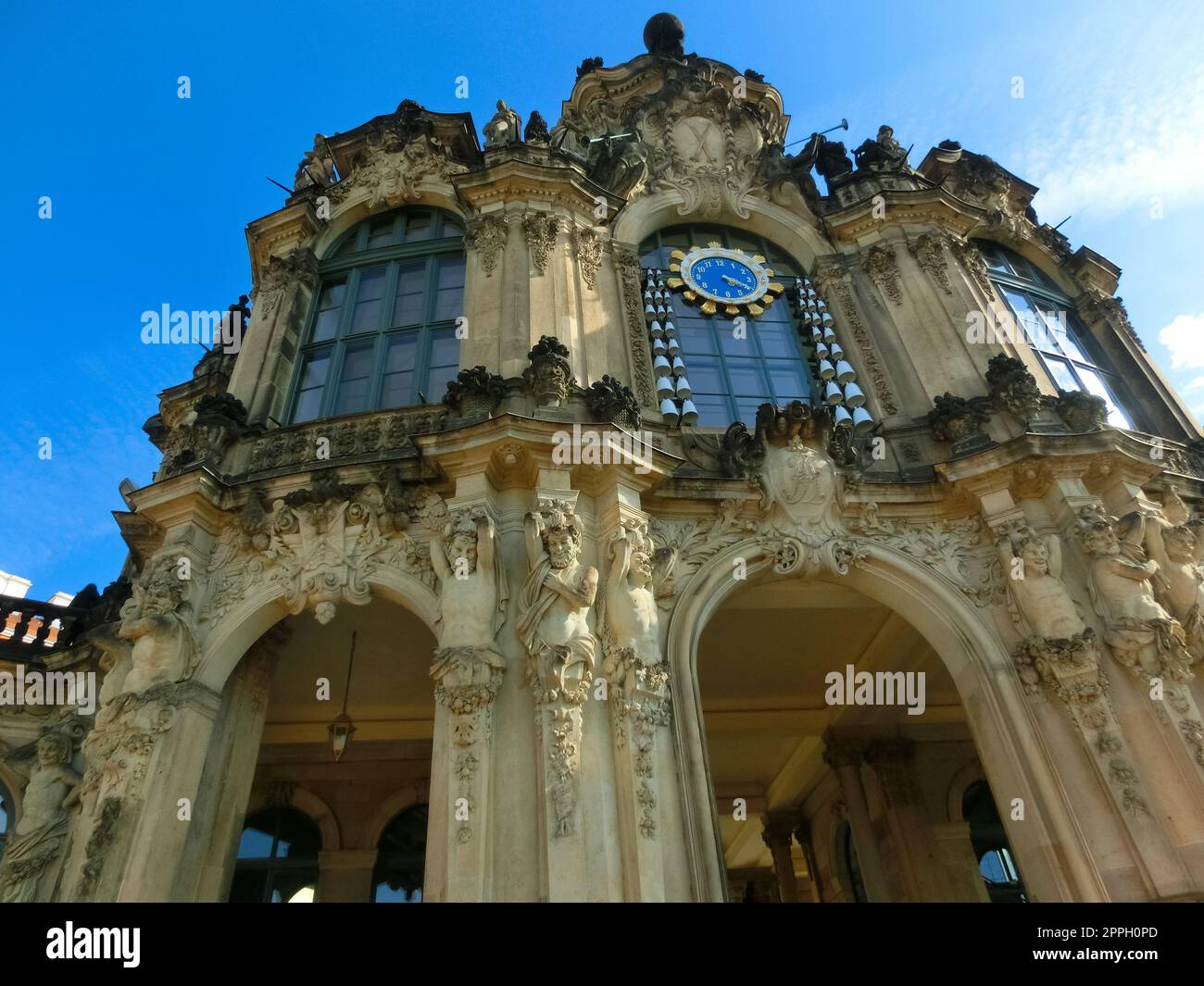 Clock with bells over the main entrance to the architectural complex ...