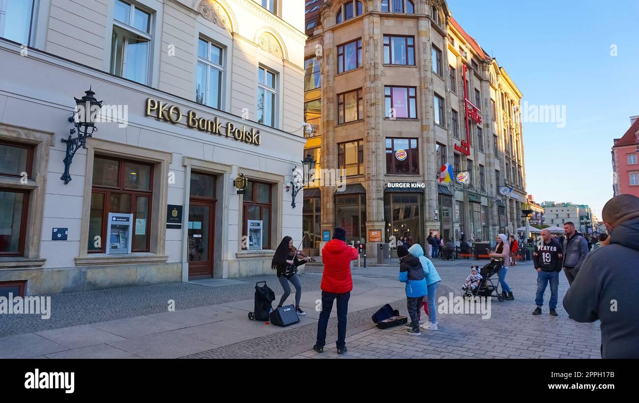 old town hall building with a clock in the center on Wroclaw Square ...