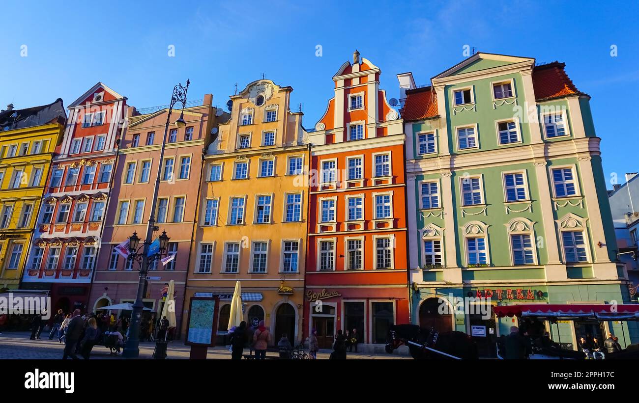 old town hall building with a clock in the center on Wroclaw Square ...