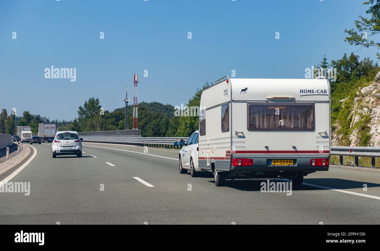 RV Mobile Home on the Highway - Home-Car Stock Photo - Alamy