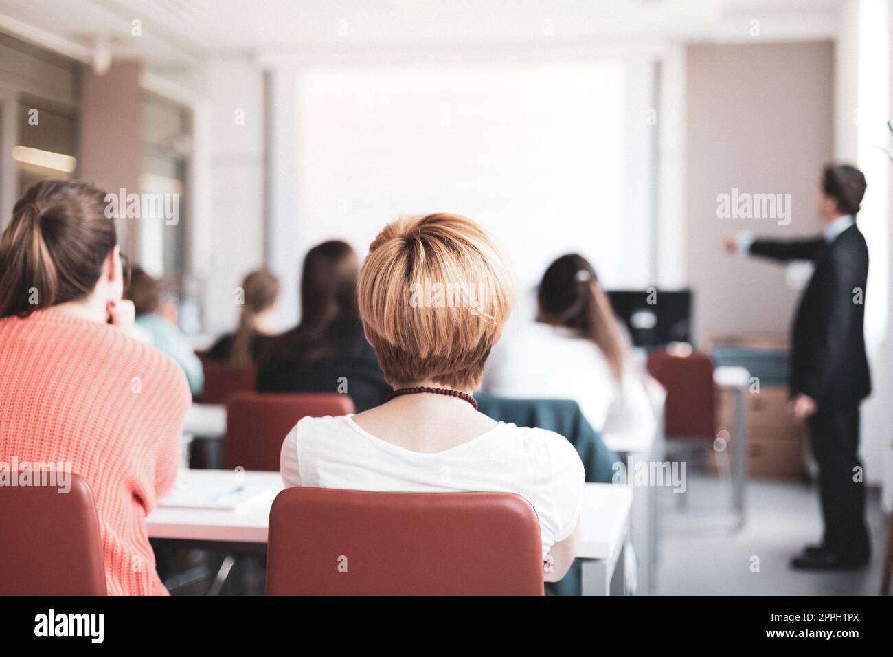 Speaker Giving a Talk at Business Meeting. Audience in the conference ...