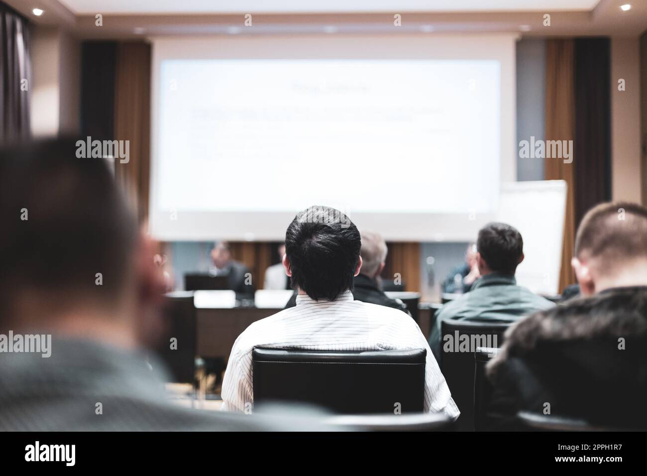 Business and entrepreneurship symposium. Speaker giving a talk at ...