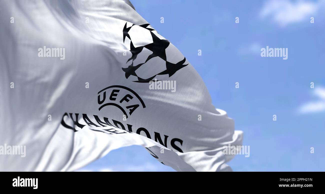 The UEFA Champions league flag waving on a clear day Stock Photo - Alamy