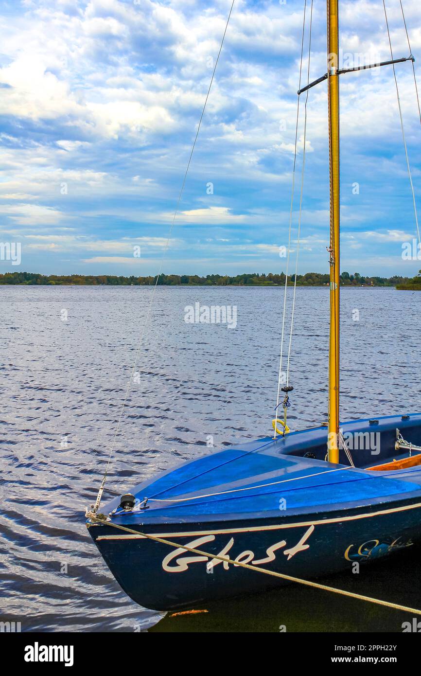 Old beautiful boats and sailboats on the jetty in Germany Stock Photo ...