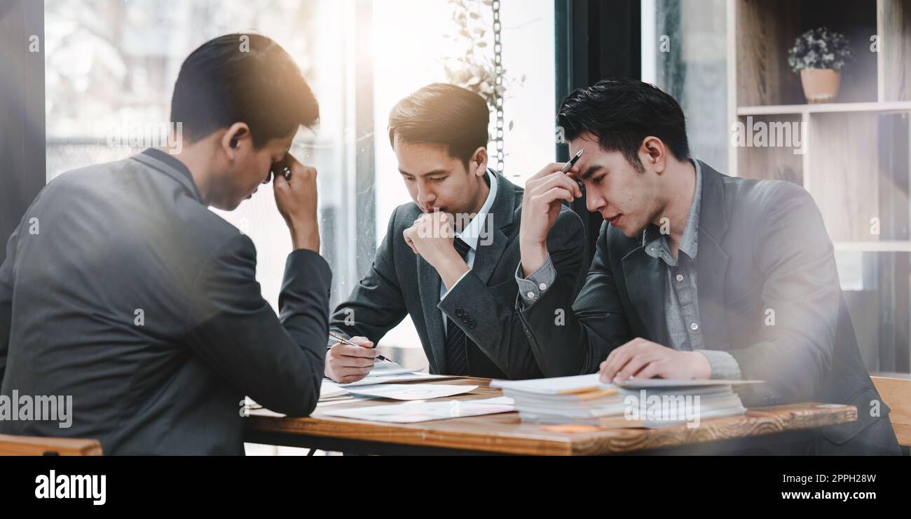 Stressed business person working and research strategy on laptop and ...