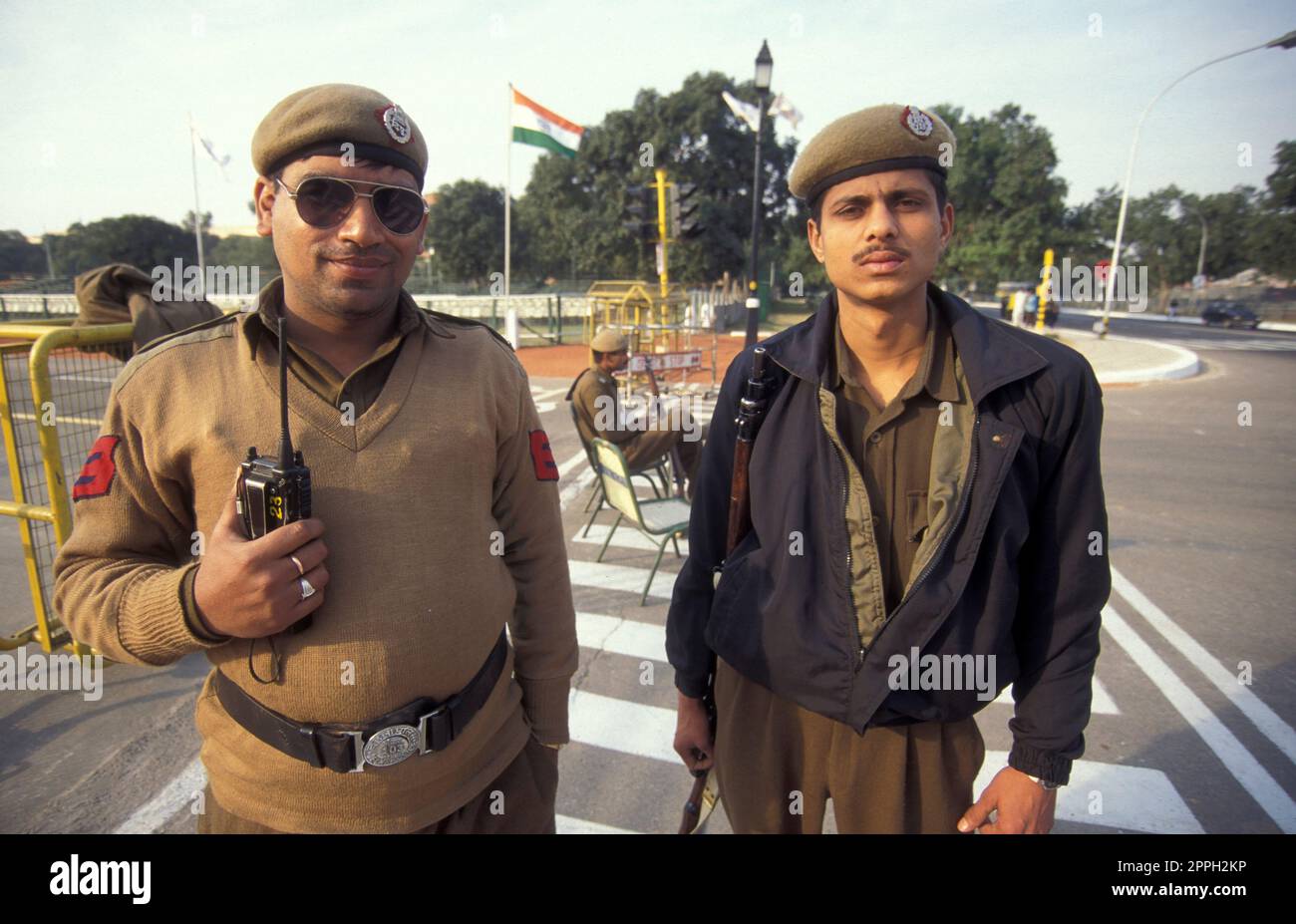 security, army and police wait on a road for the Parade at the Republic ...