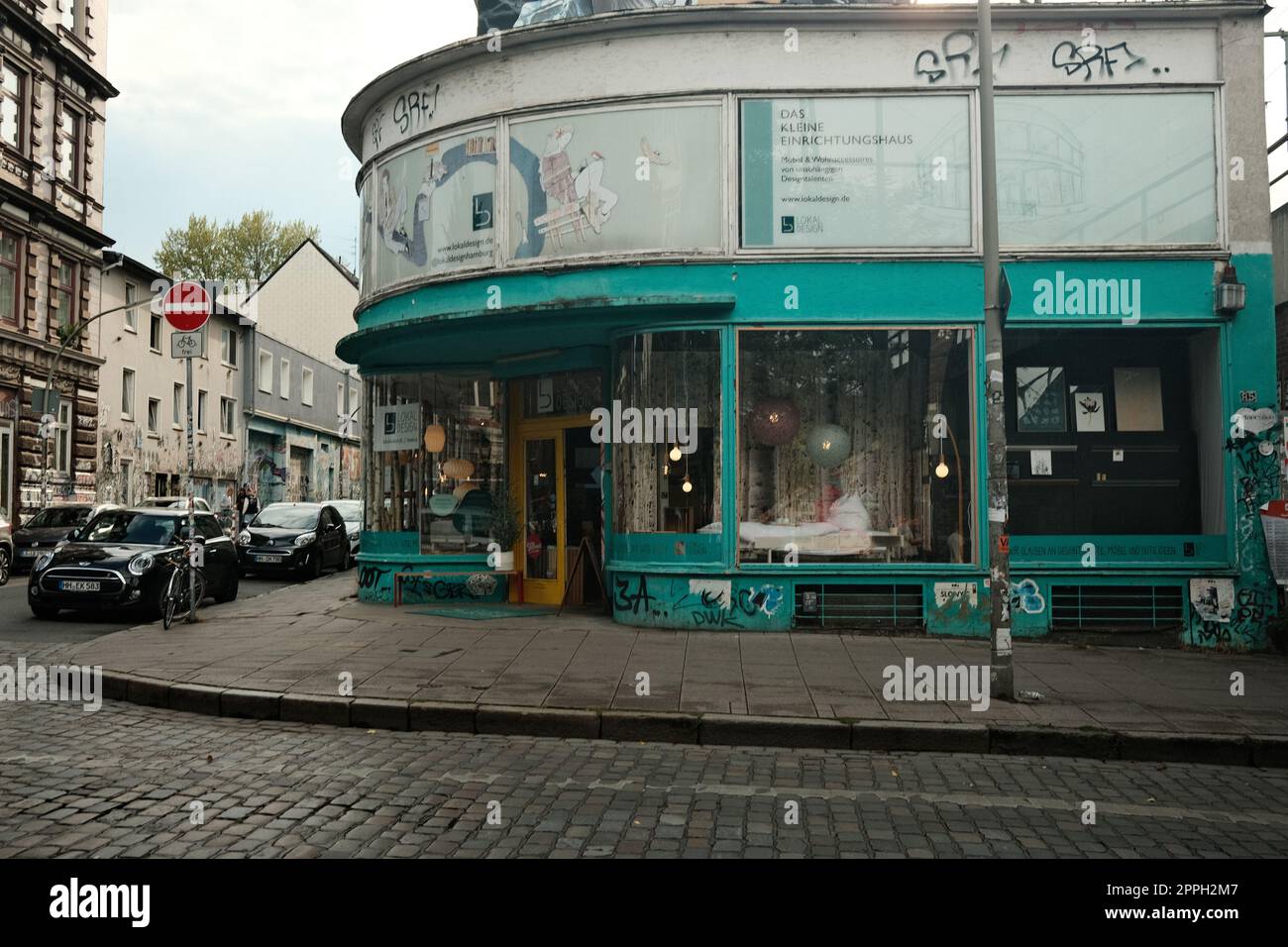 Turquoise house with glass facade in Hamburg, Germany Stock Photo - Alamy