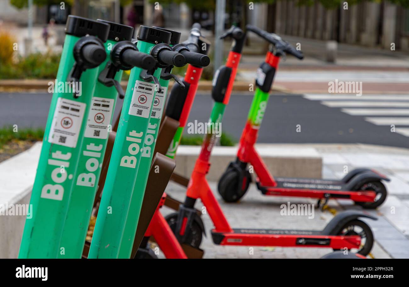 Bolt, Lime and Uber Scooters Stock Photo - Alamy