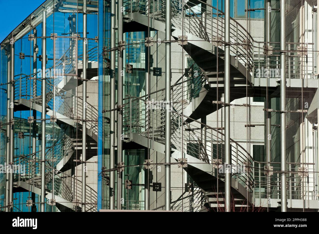 glazed staircase on the outer facade of a modern office building Stock ...