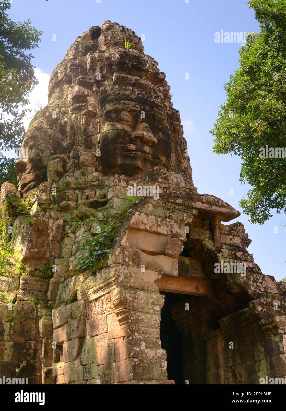 Face tower on the eastern entrance of Banteay Kdei temple, in Angkor ...