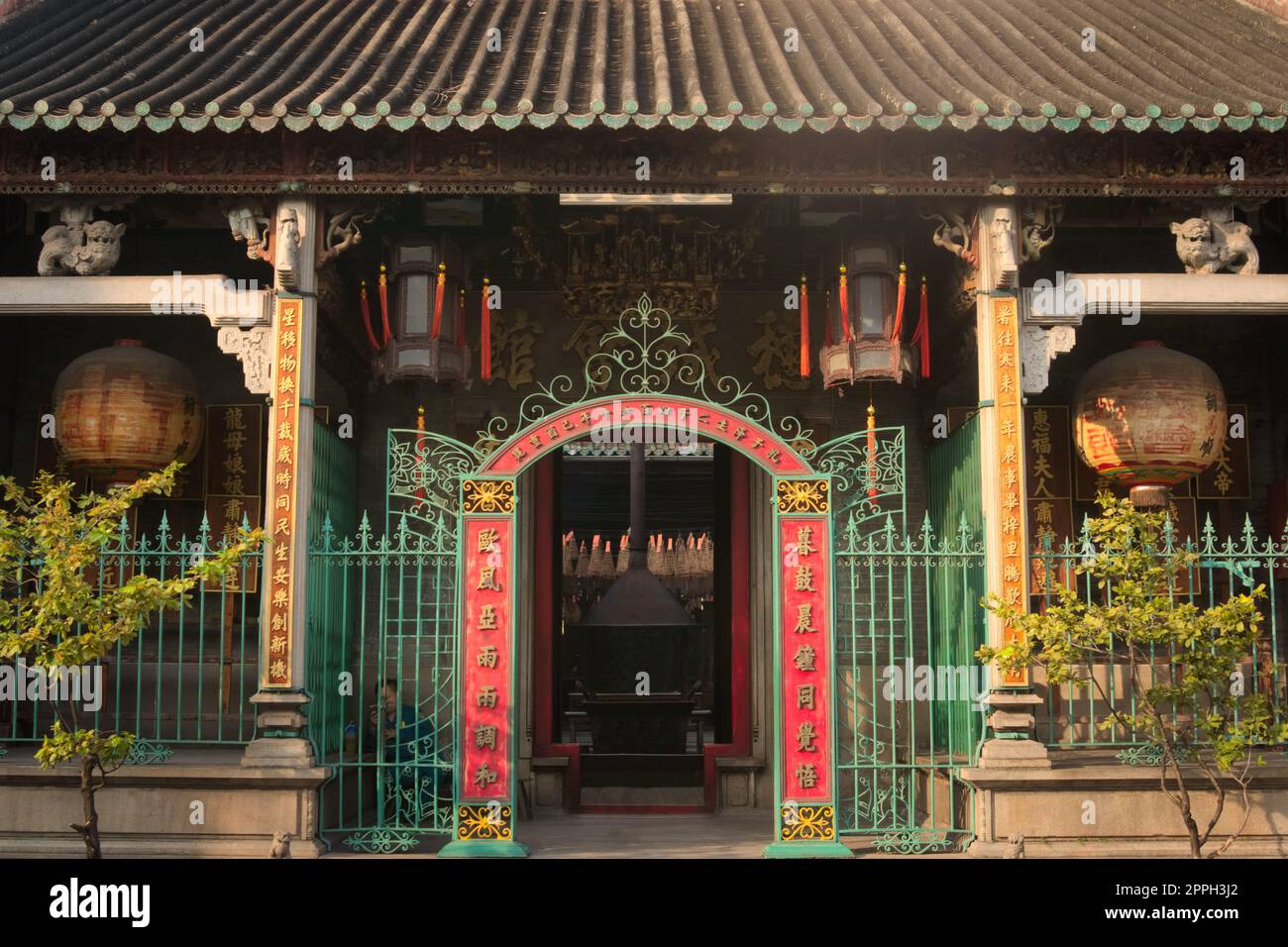 Red entrance gate to a traditional chinese buddhist temple in Saigon ...