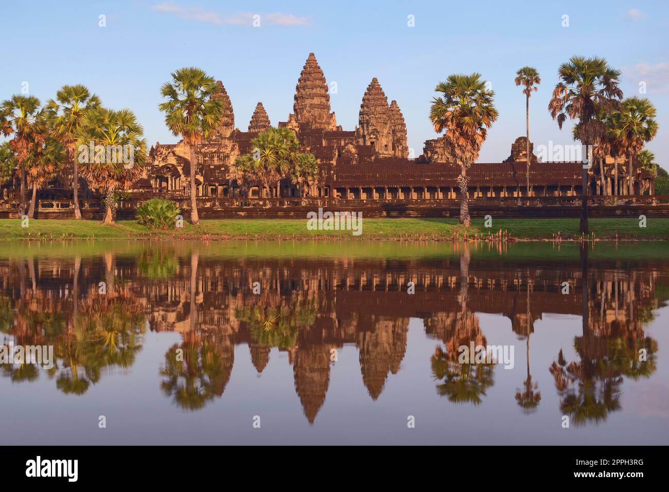 Angkor Wat, in Cambodia. Front general view of western facade at sunset ...