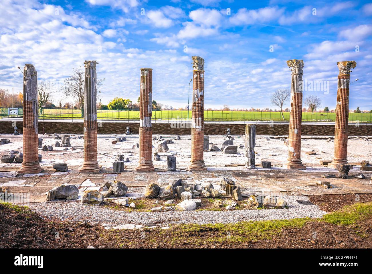 Ancient Roman columns and artefacts in historic site of Aquileia Stock ...