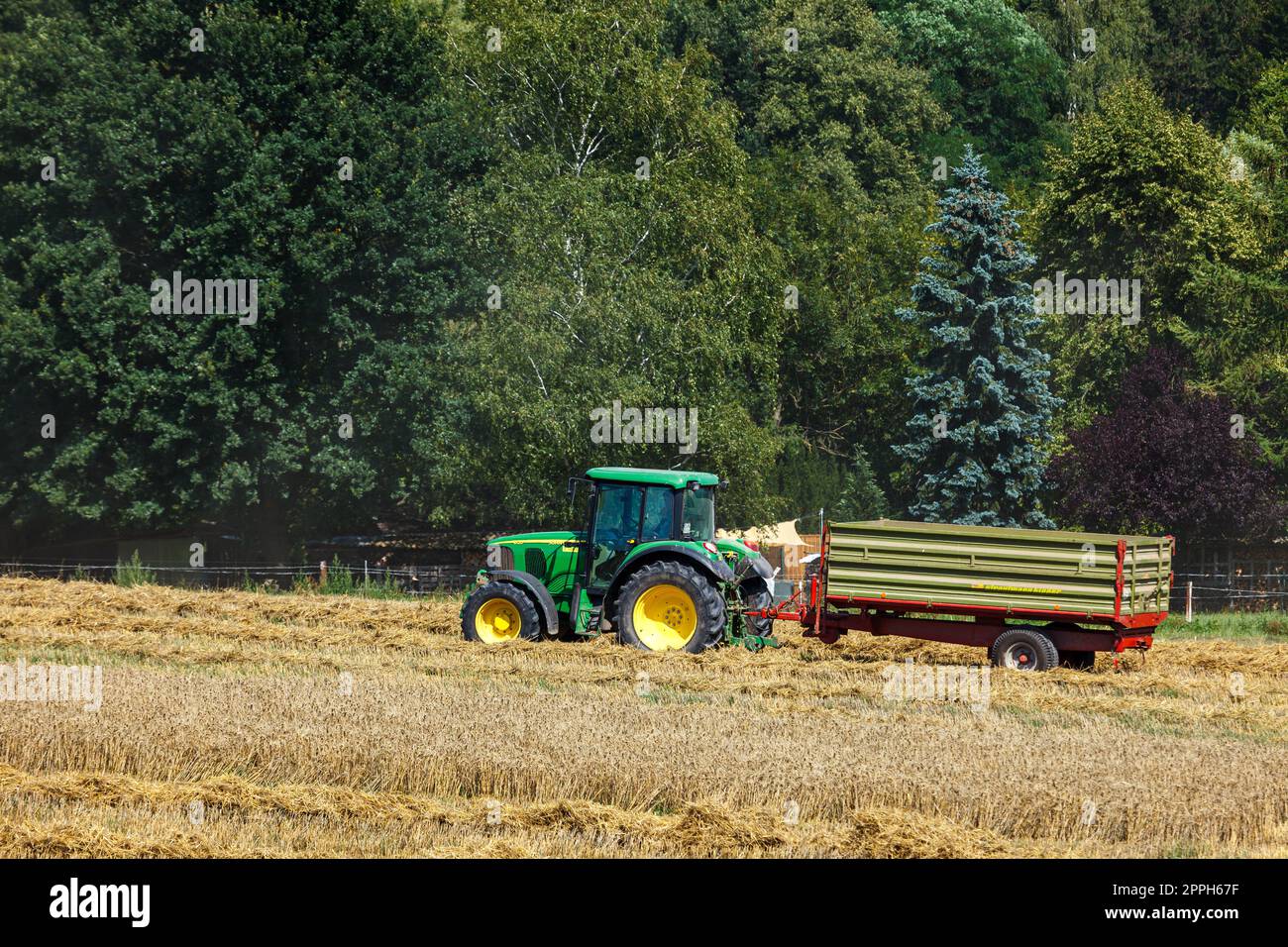 agriculture at the harvest time in summer Stock Photo - Alamy