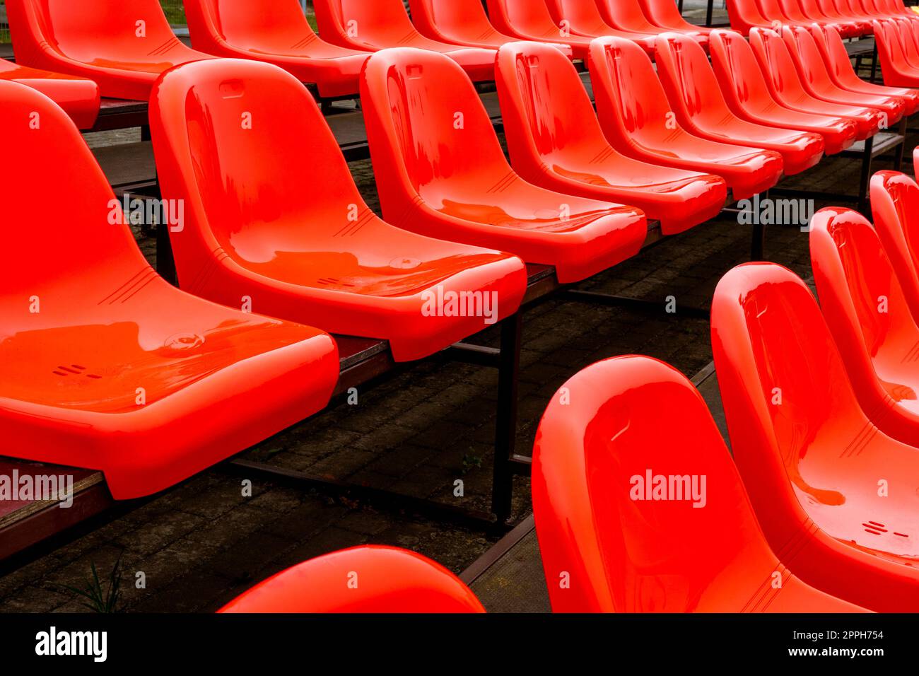 Red stadium seats Stock Photo - Alamy