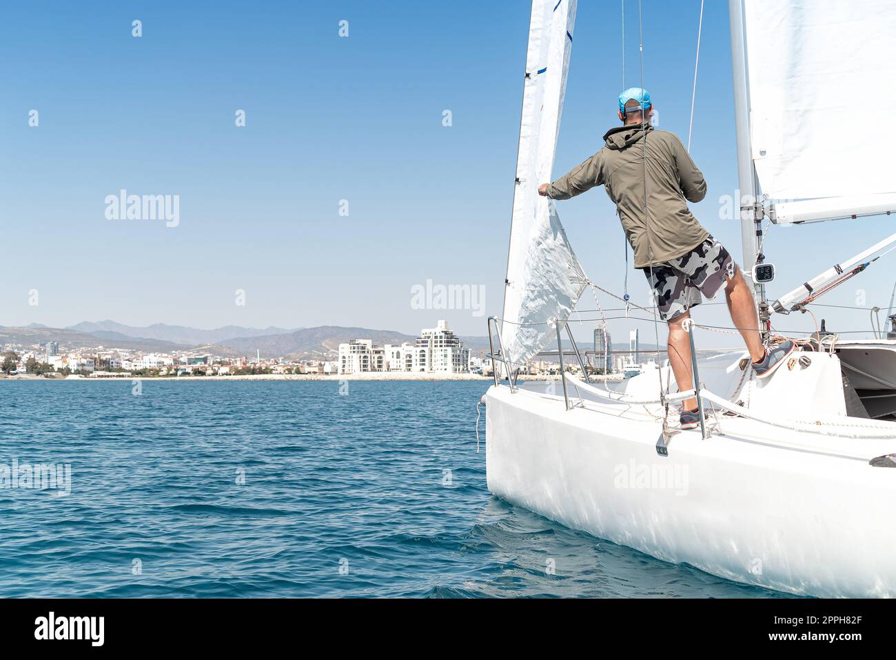 Adjusting sail hi-res stock photography and images - Alamy