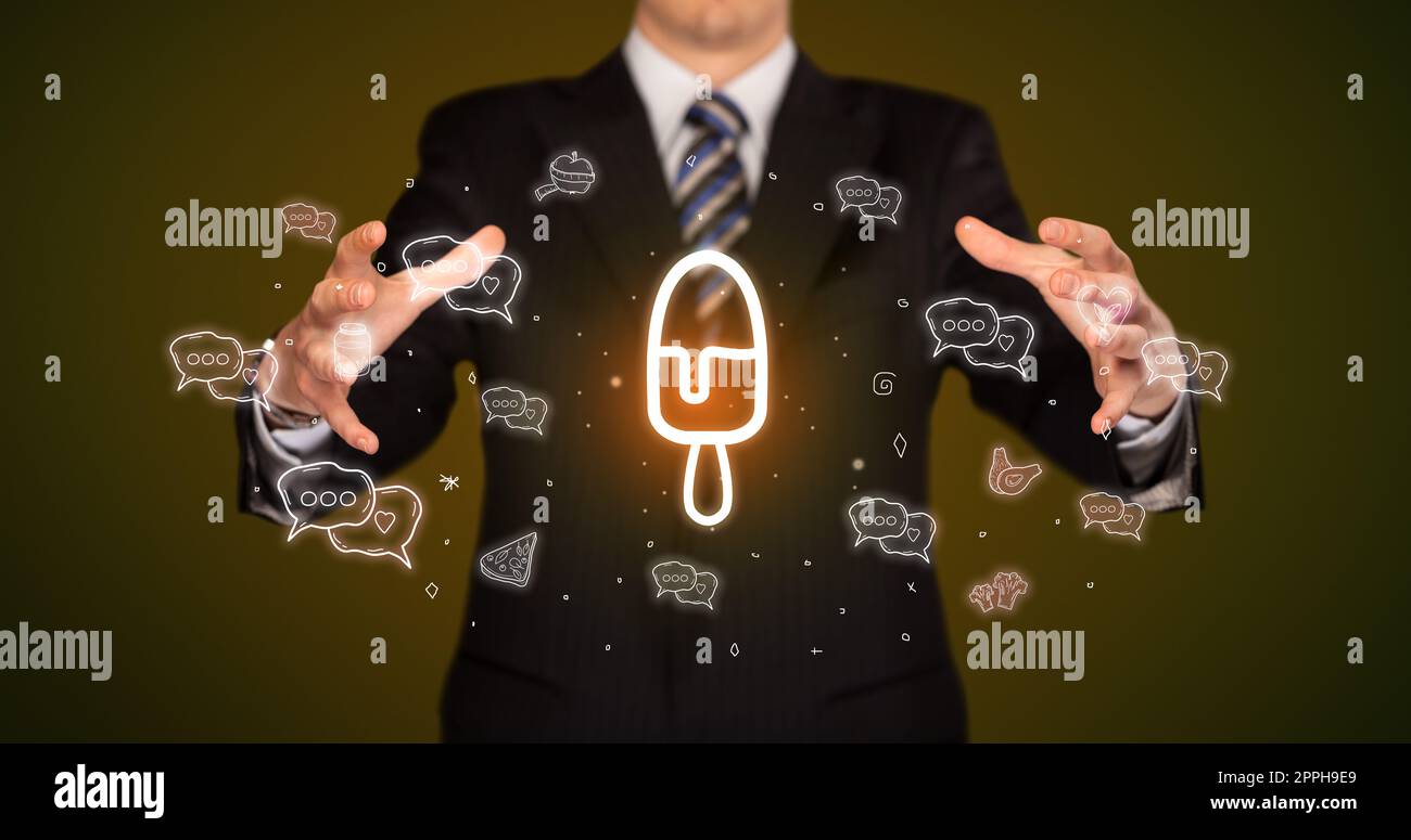 Hand holding food related icons Stock Photo - Alamy