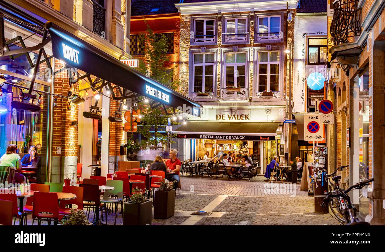 LEUVEN, BELGIUM - AUG 25, 2022: Restaurants in the old town of Leuven ...
