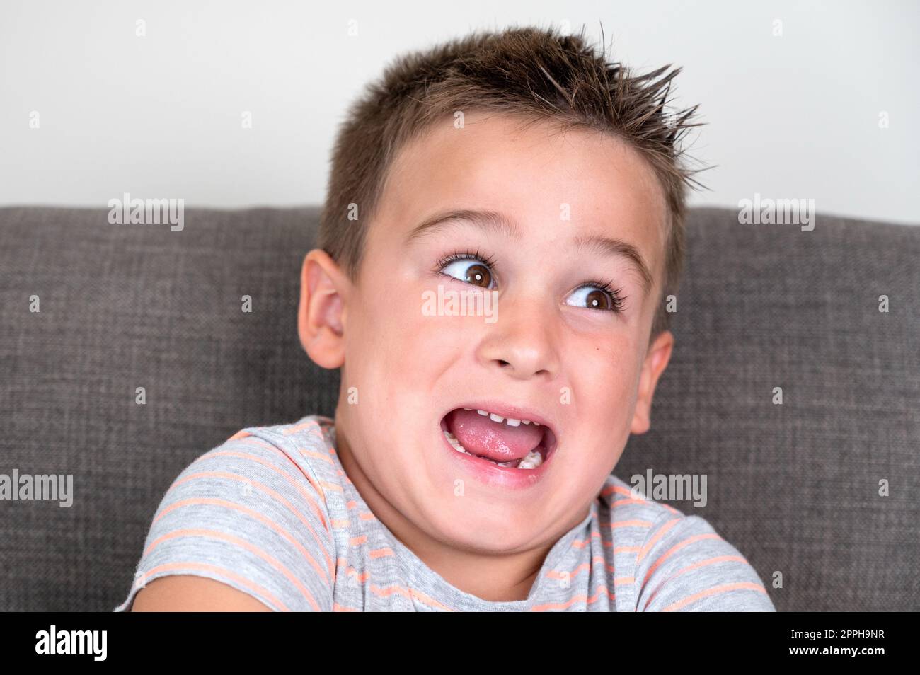 Portrait of a funny Male Child Making Faces Stock Photo - Alamy