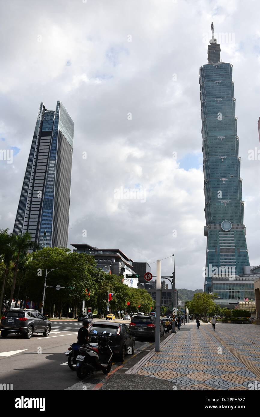 Taipei Nan Shan Plaza and Taipei 101 skyscrapers against a cloudy sky ...