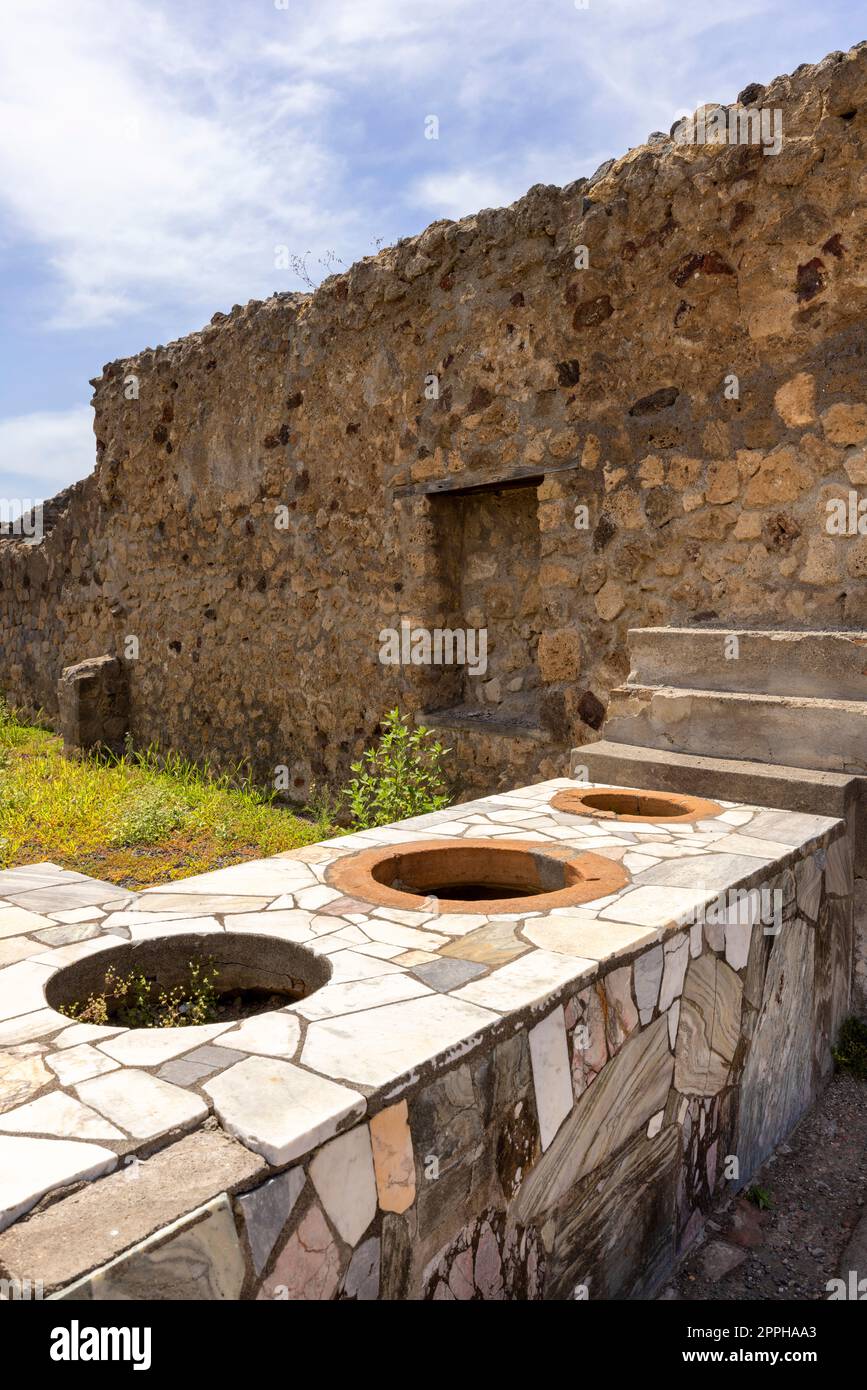 Ruins of an ancient city destroyed by the eruption of the volcano ...