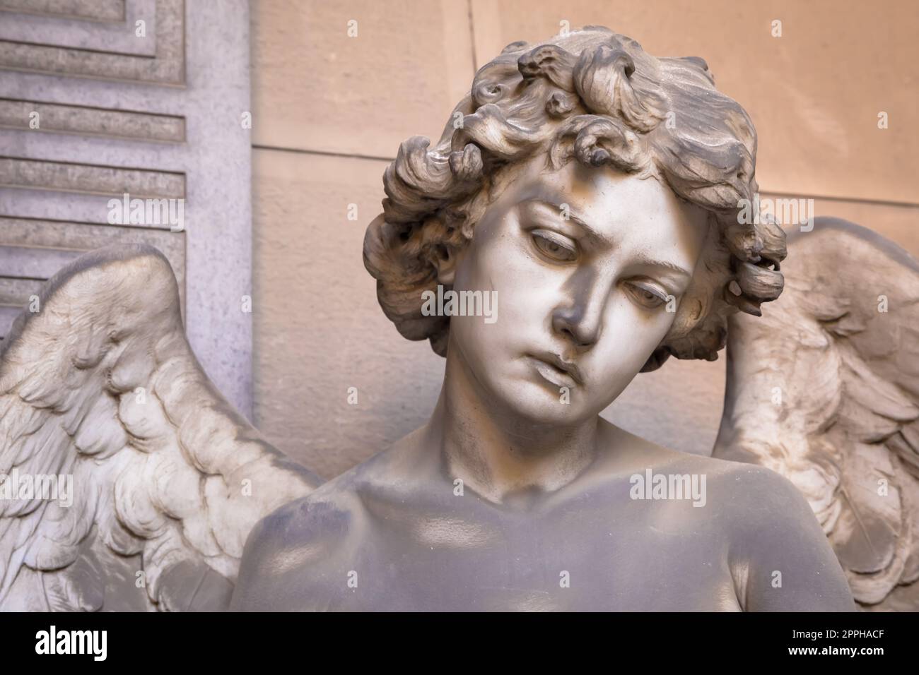 Statue of angel on an old tomb located in Genoa cemetery - Italy Stock ...
