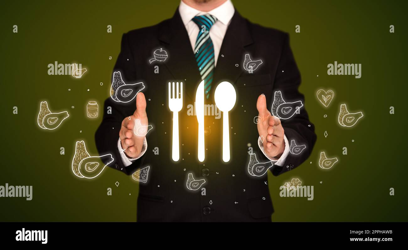 Hand holding food related icons Stock Photo - Alamy