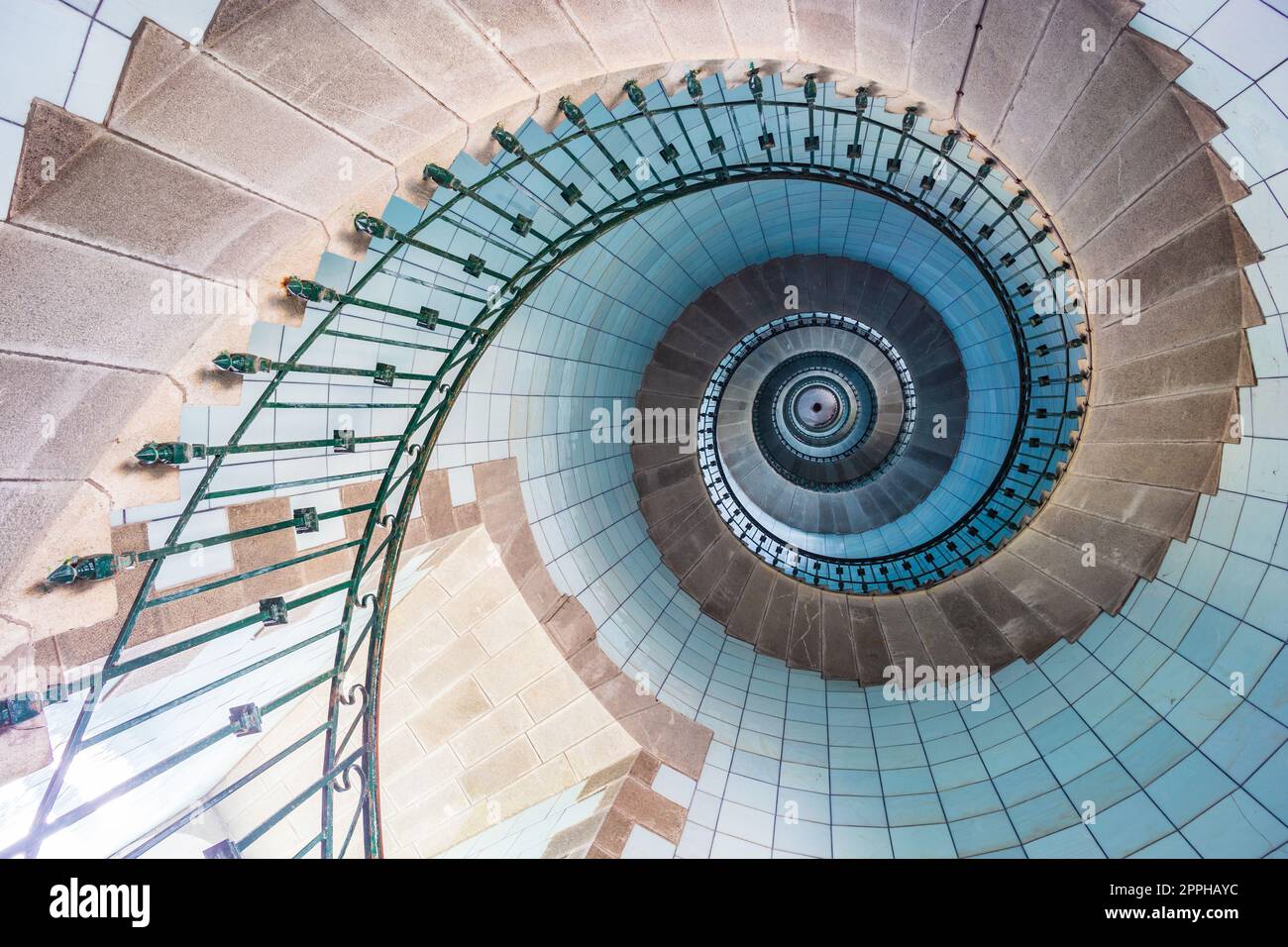 Spiral stairs and blue opaline inside the lighthouse Stock Photo - Alamy