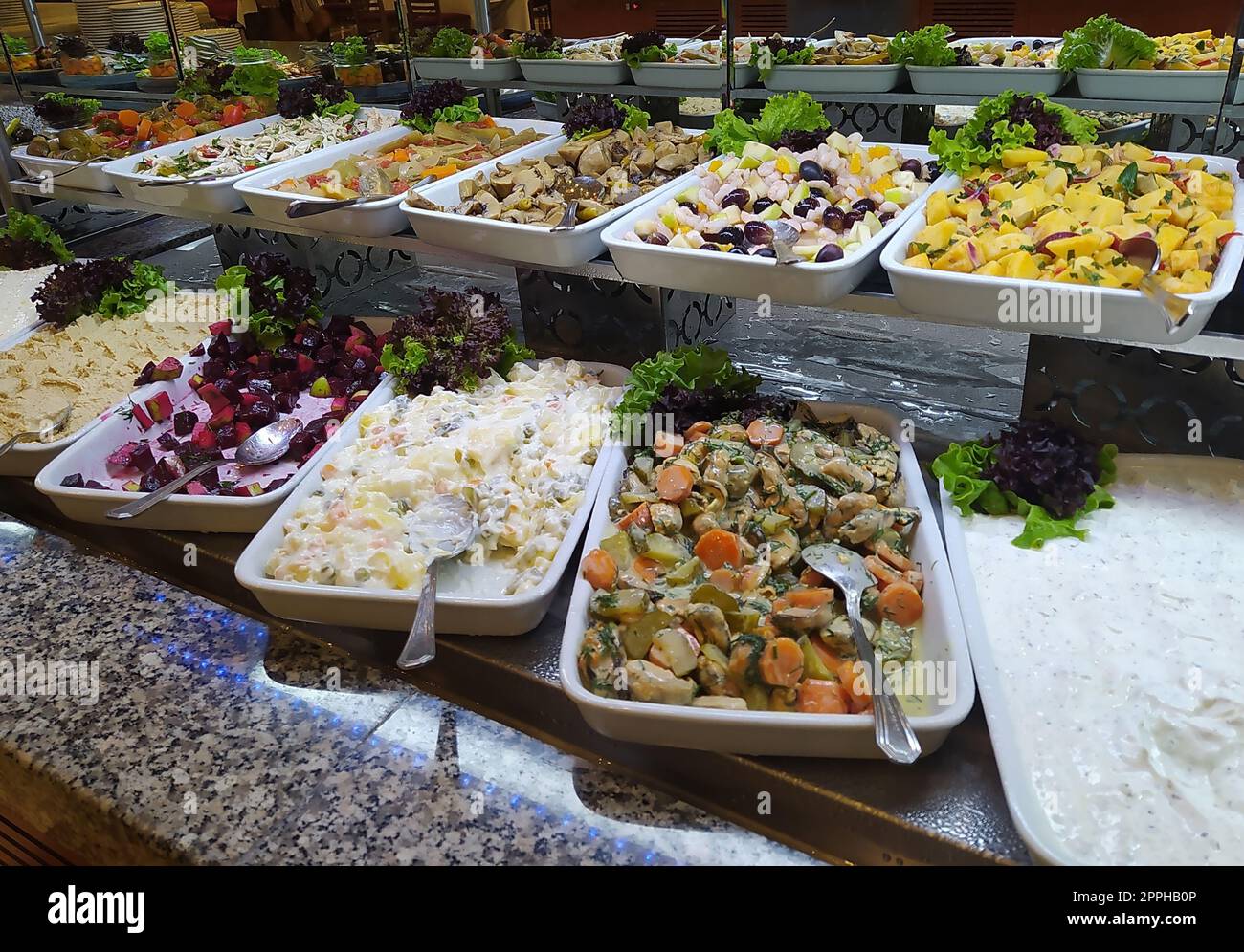 Food on the shelves in the self-service buffet with all inclusive in ...