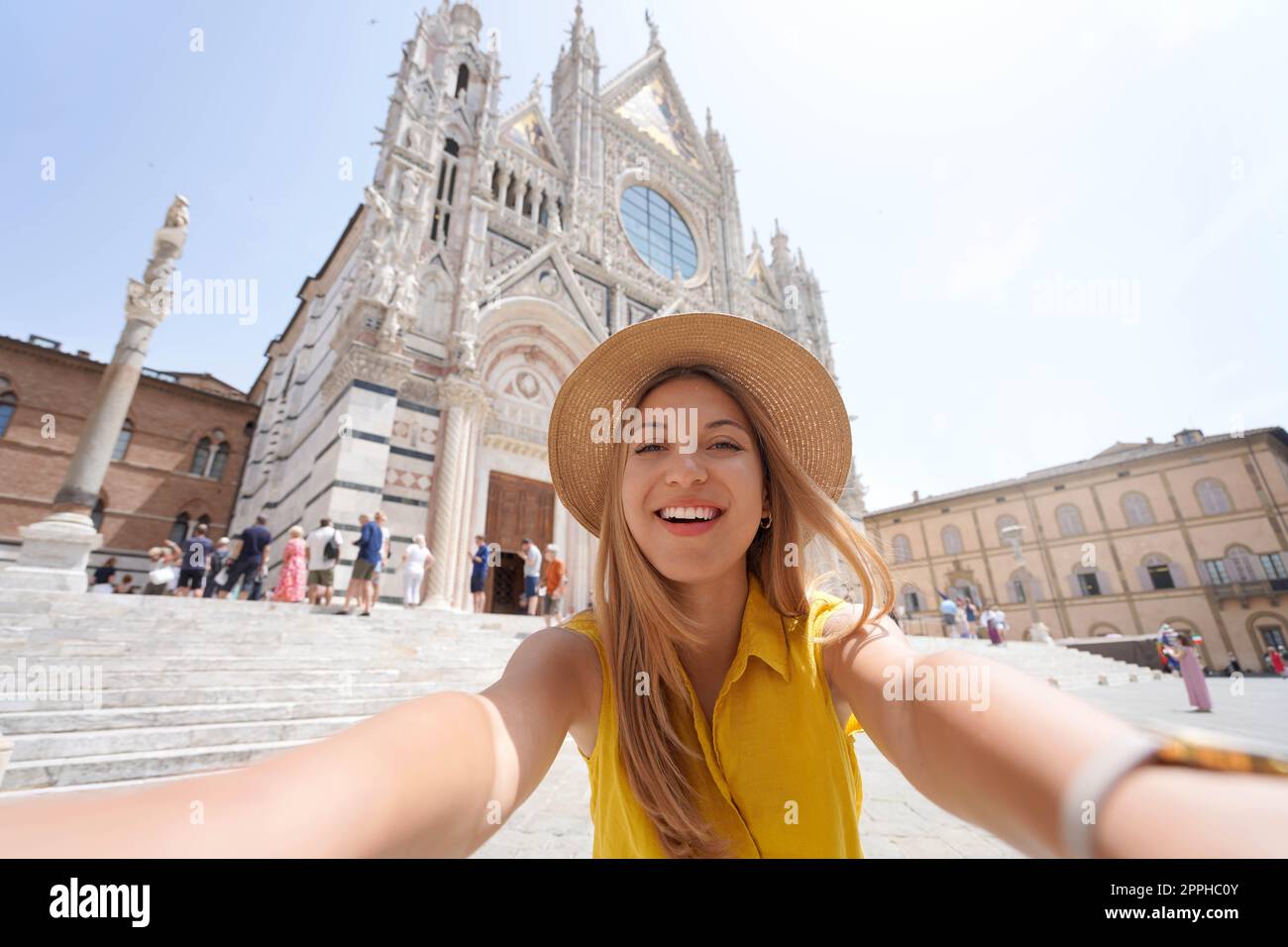 Selfie girl in Siena, Italy. Young tourist woman taking self portrait ...