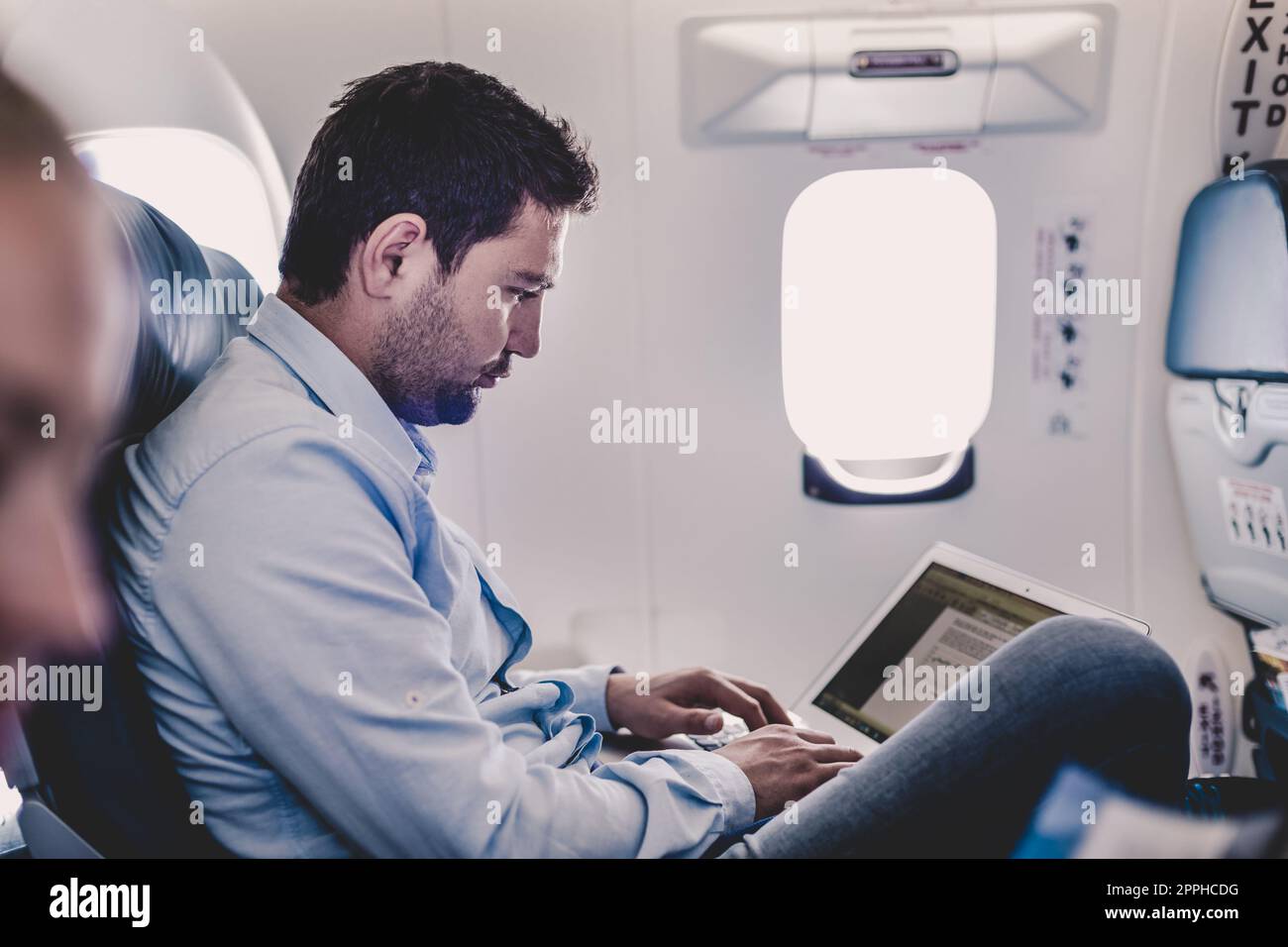Laptop passenger seat plane hi-res stock photography and images - Alamy