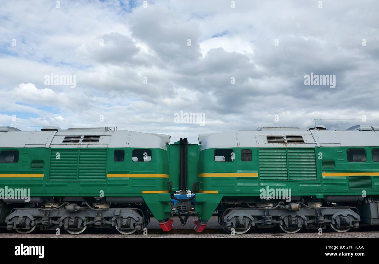 Transition between two electric trains. A small corridor in the role of a portal between the two ...