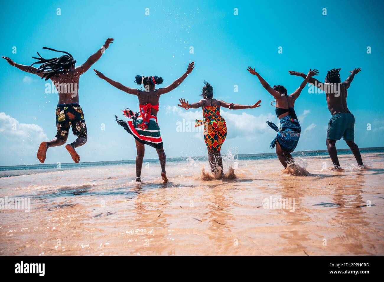 Happy jumping people hi-res stock photography and images - Alamy